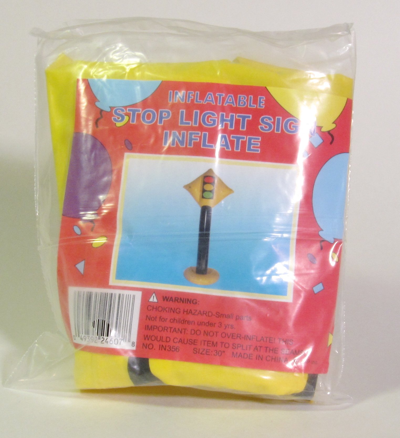 Traffic light toys, old and new, for little kids and big.